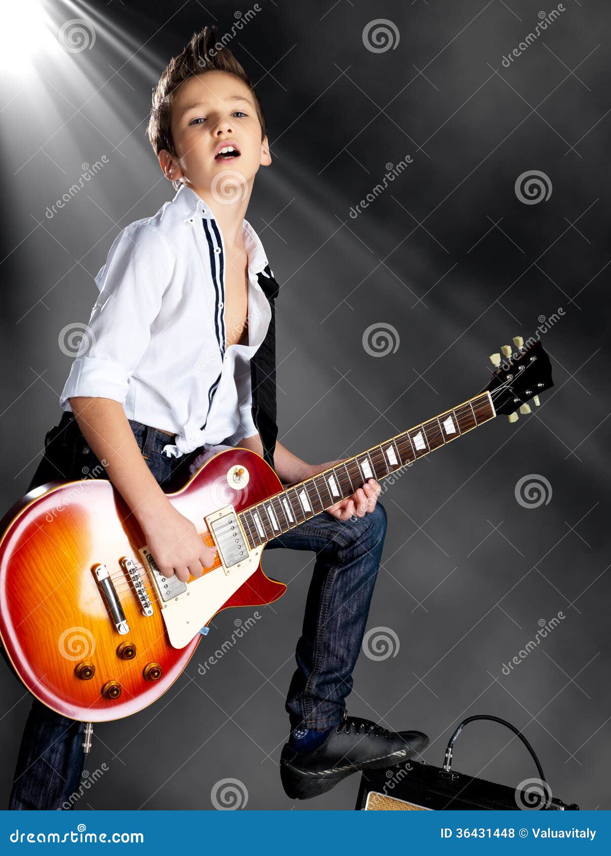 Boy Playing on Electric Guitar on the Stage Stock Photo - Image of song ...