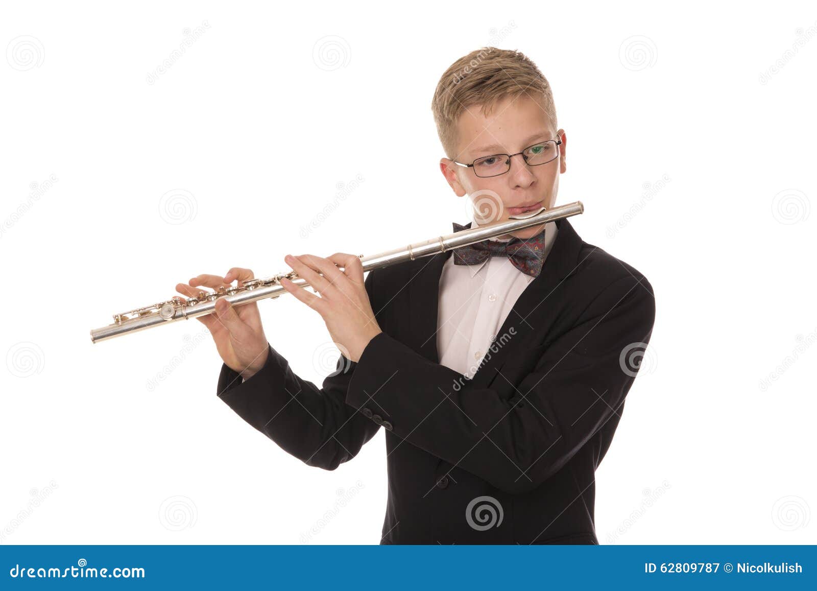 Boy playing a flute stock image. Image of musician, flute - 62809787