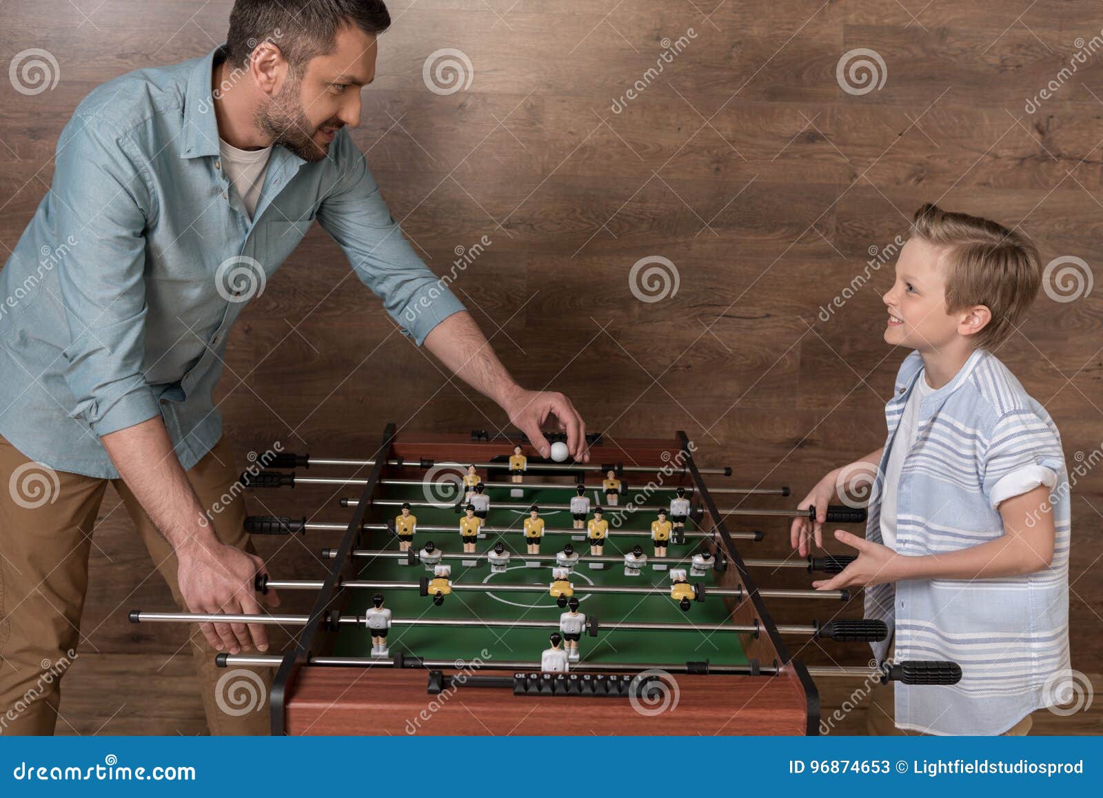 Boy Playing Foosball Together with Father Stock Image - Image of family ...