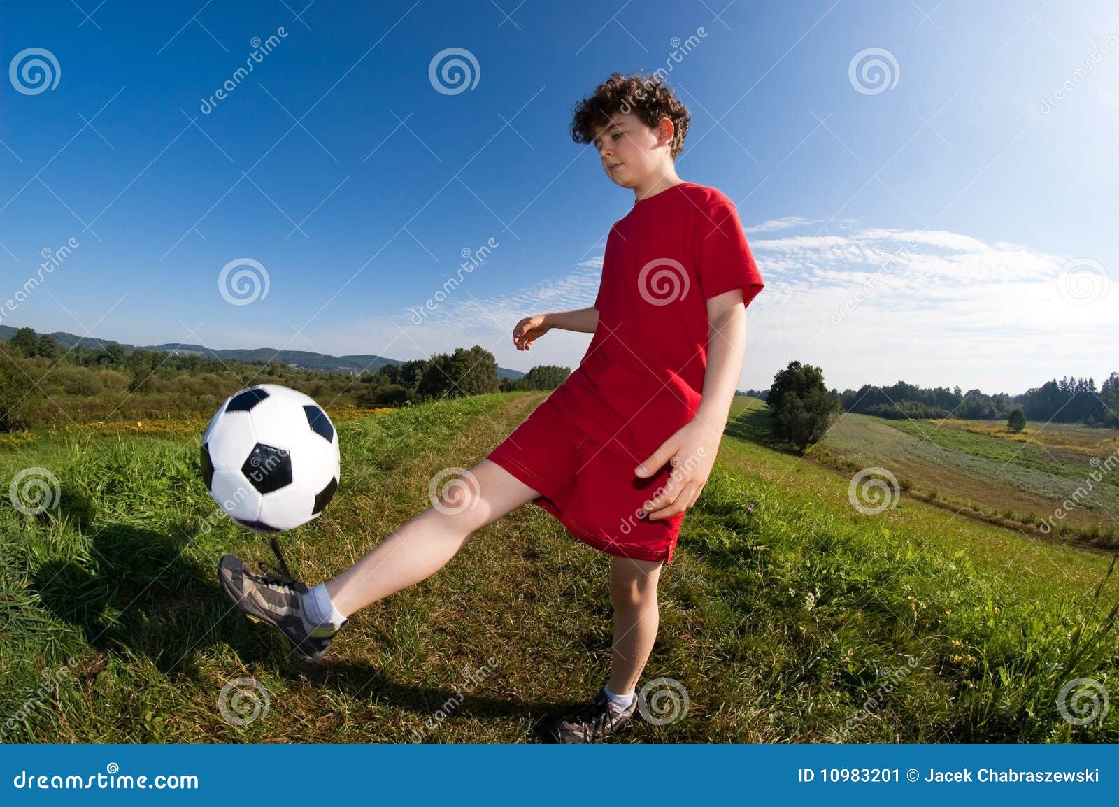 Boy playing football stock image. Image of football, outdoors - 10983201