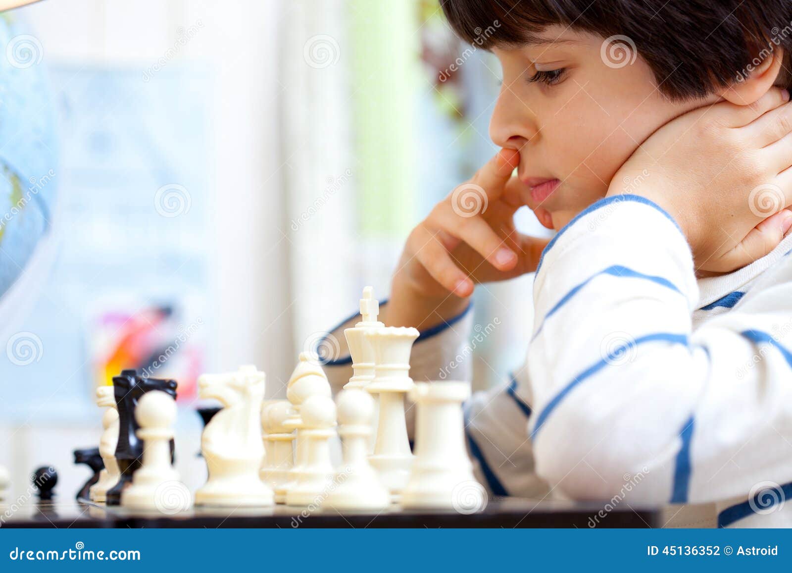 Boy Playing a Game of Chess Stock Photo - Image of competition, color ...