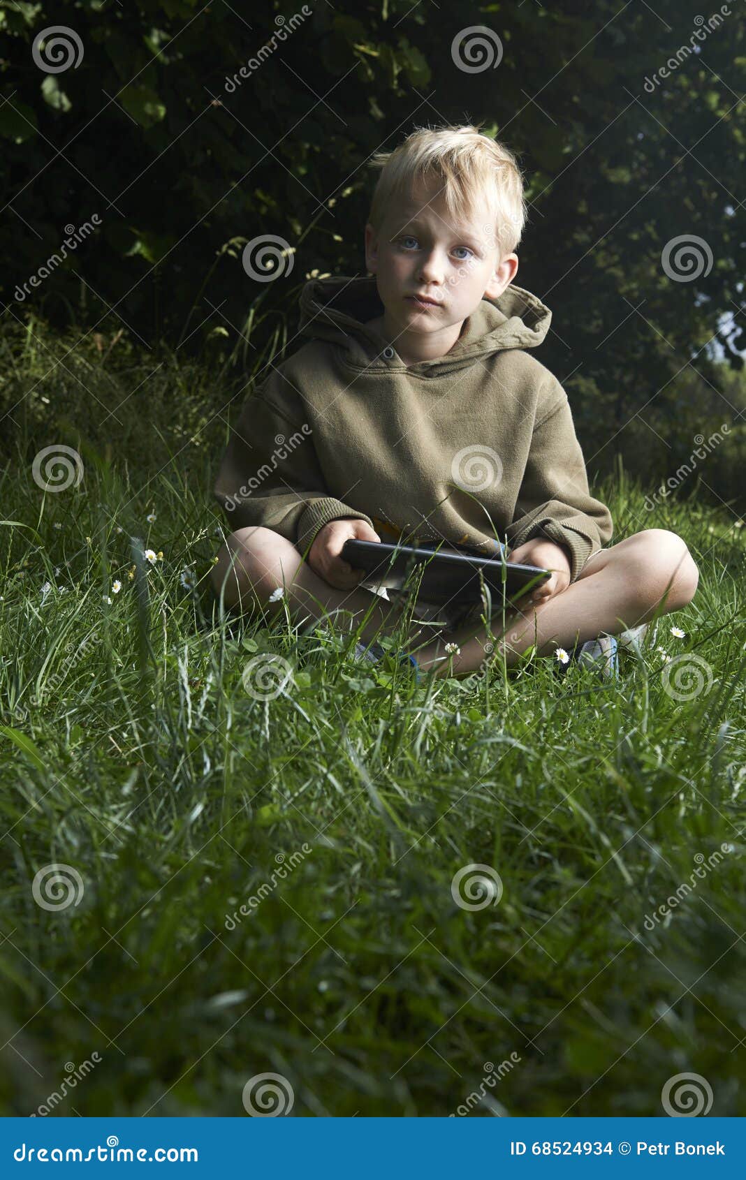 Boy Playing Game with Tablet Pc Outdoors Stock Photo - Image of garden ...