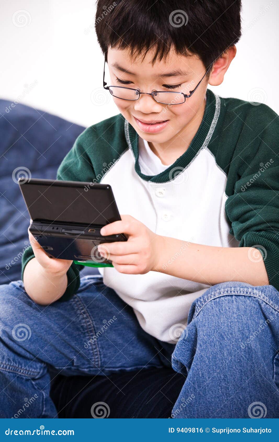 Boy playing games stock photo. Image of cute, vertical - 9409816