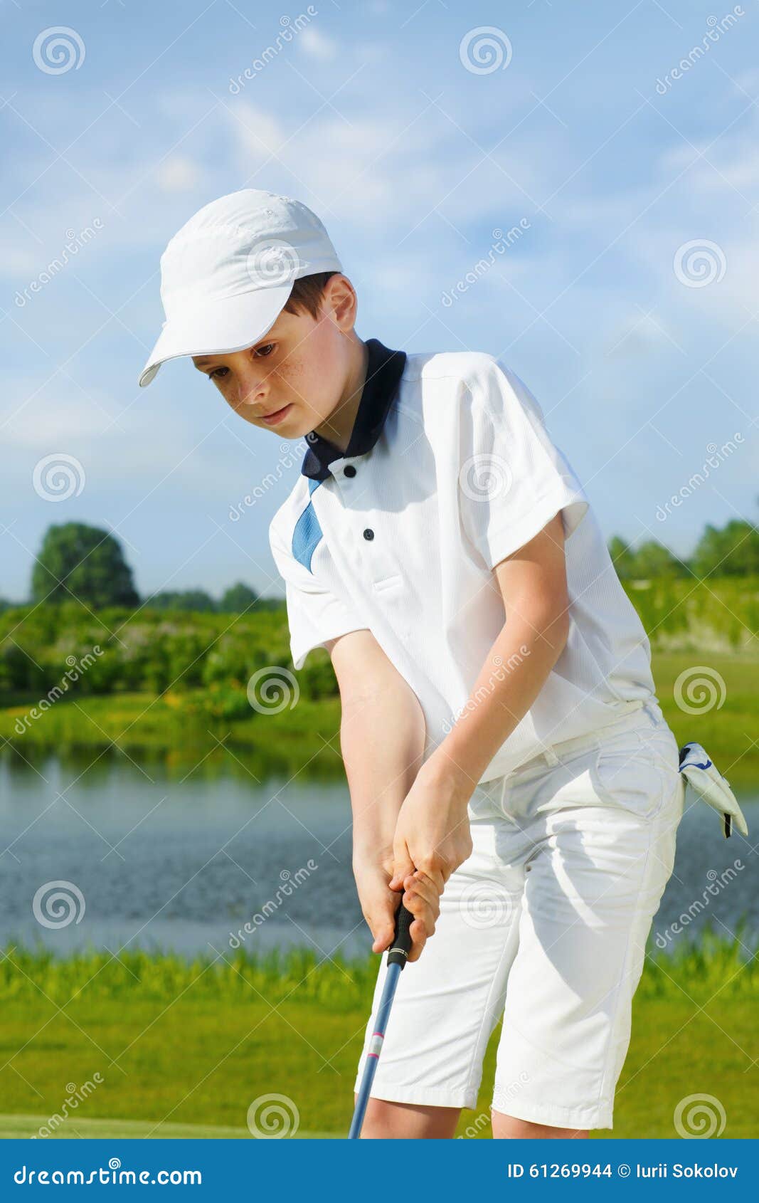 Boy playing golf stock photo. Image of people, practice - 61269944