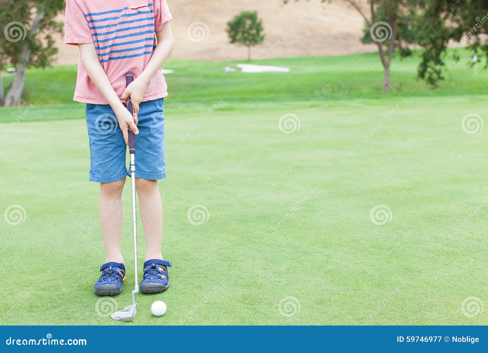 Boy playing golf stock image. Image of country, golfing - 59746977