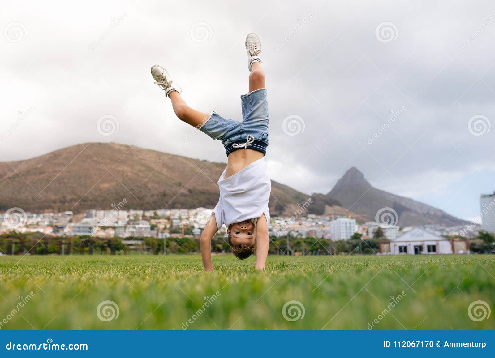 Boy playing in the ground stock photo. Image of park - 112067170