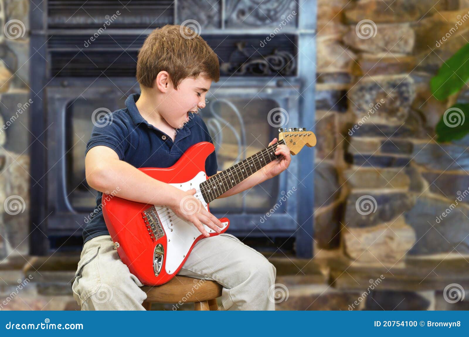 Boy Playing Guitar stock photo. Image of enjoymant, people - 20754100