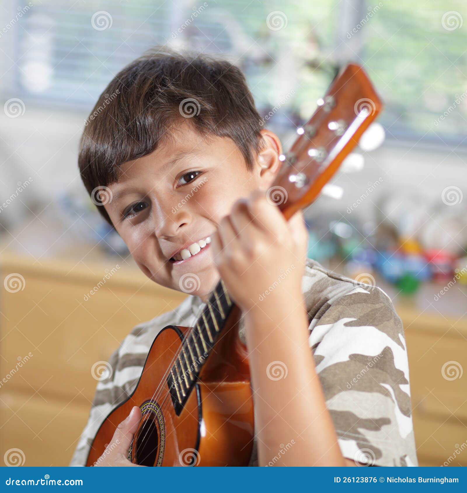 Boy playing guitar stock photo. Image of guitar, music - 26123876