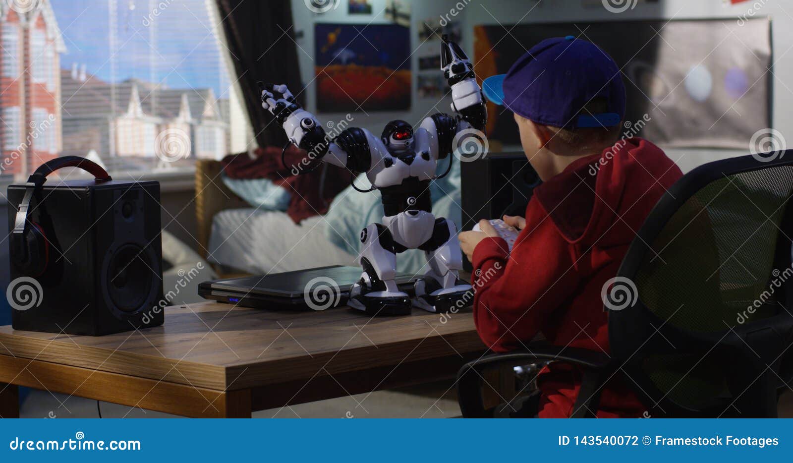 Boy Playing with His Toy Robot Stock Photo - Image of indoors, modern ...