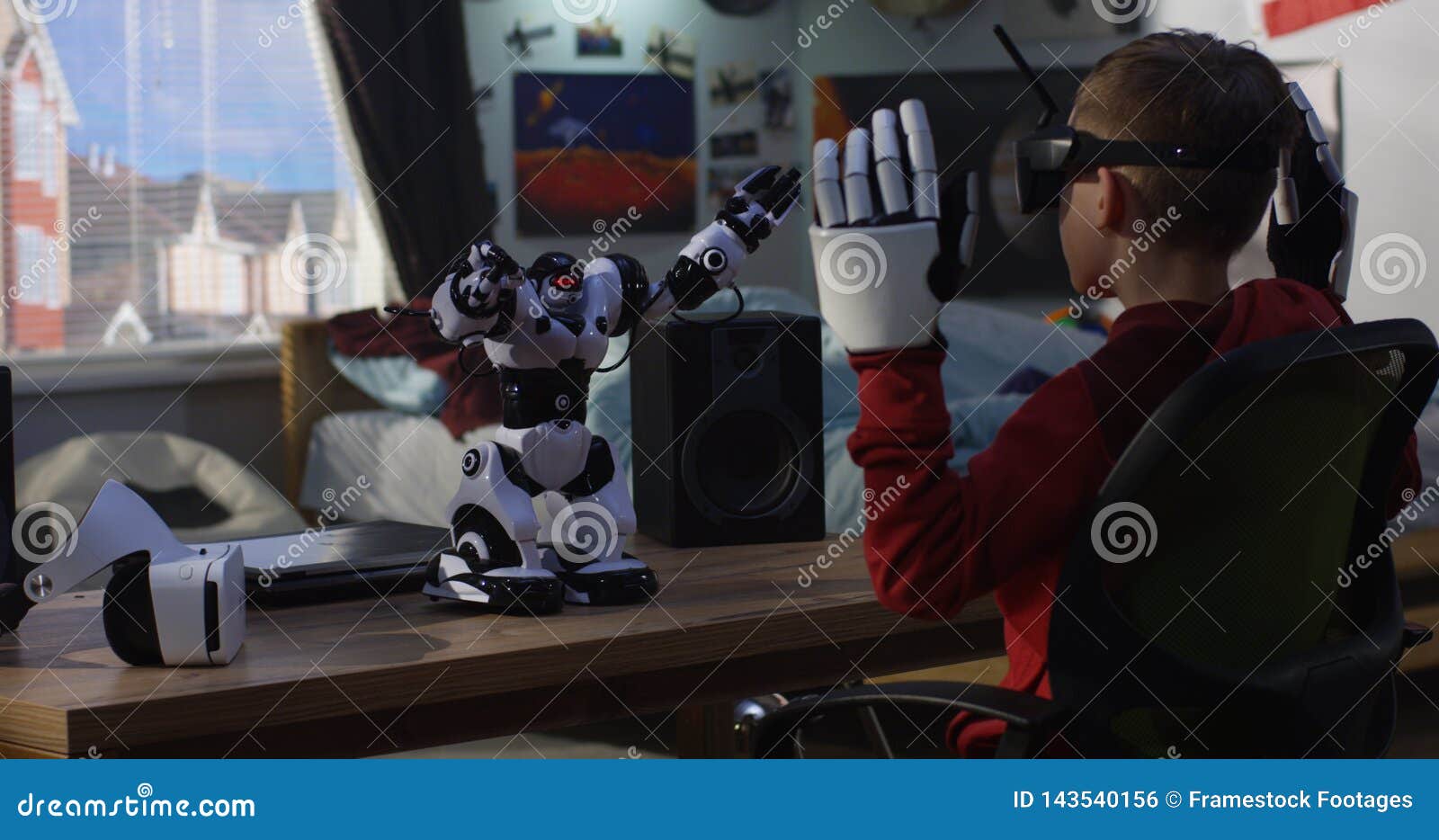 Boy Playing with His Toy Robot Stock Photo - Image of childhood, table ...