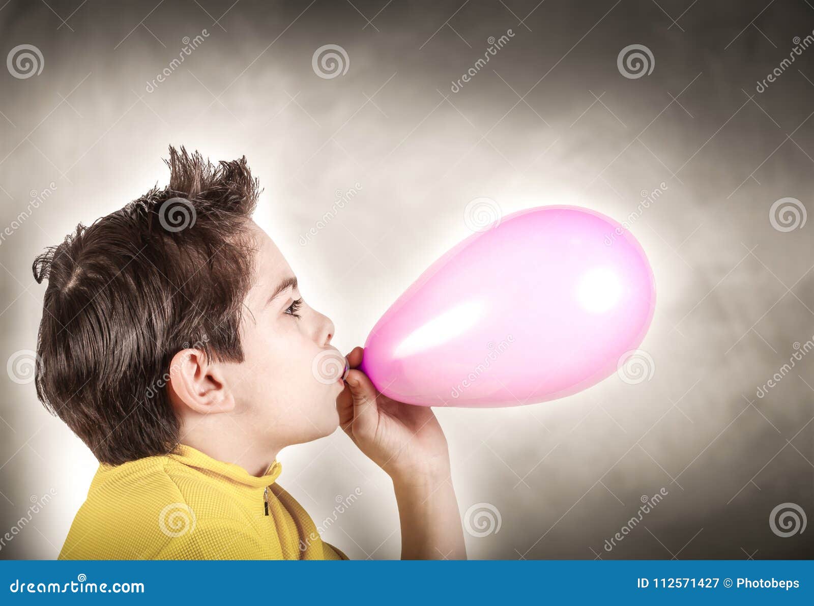Boy Playing Inflating a Balloon Stock Image - Image of game, puff ...
