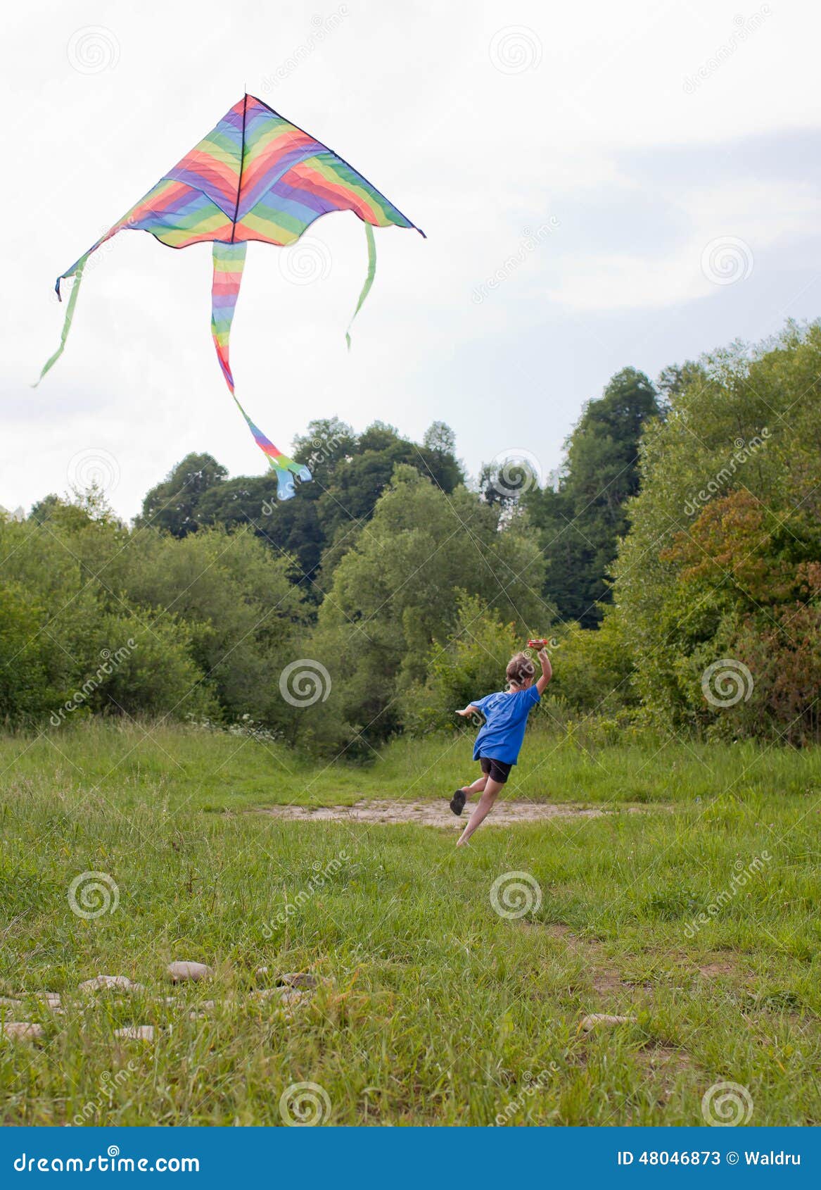 Boy playing with kite stock image. Image of motion, full - 48046873