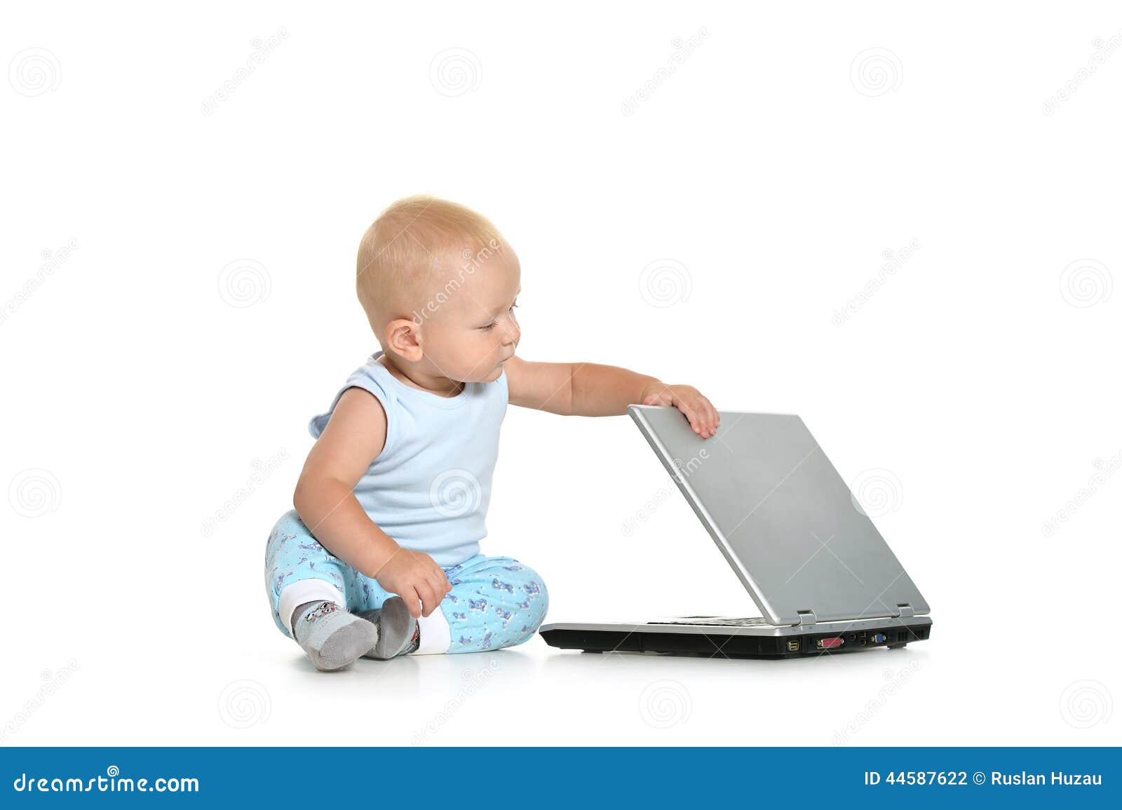 Boy playing with laptop stock photo. Image of play, game - 44587622