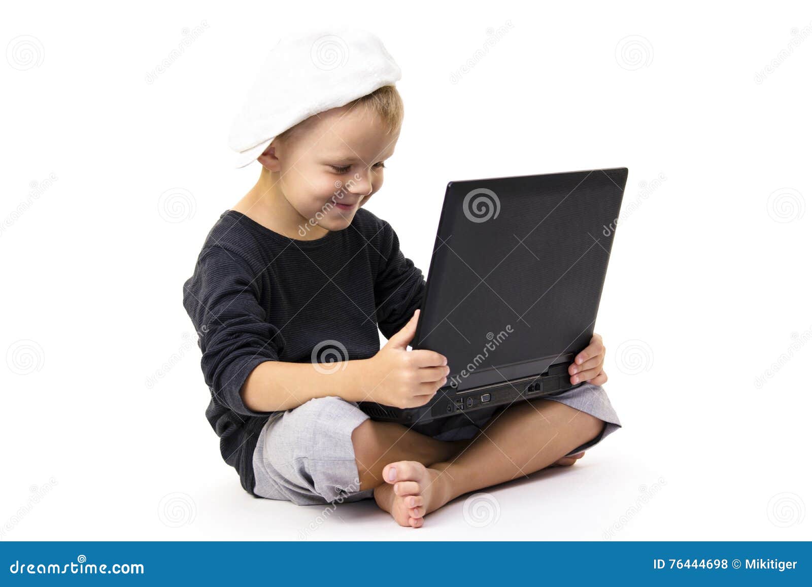 Boy playing laptop stock photo. Image of white, child - 76444698