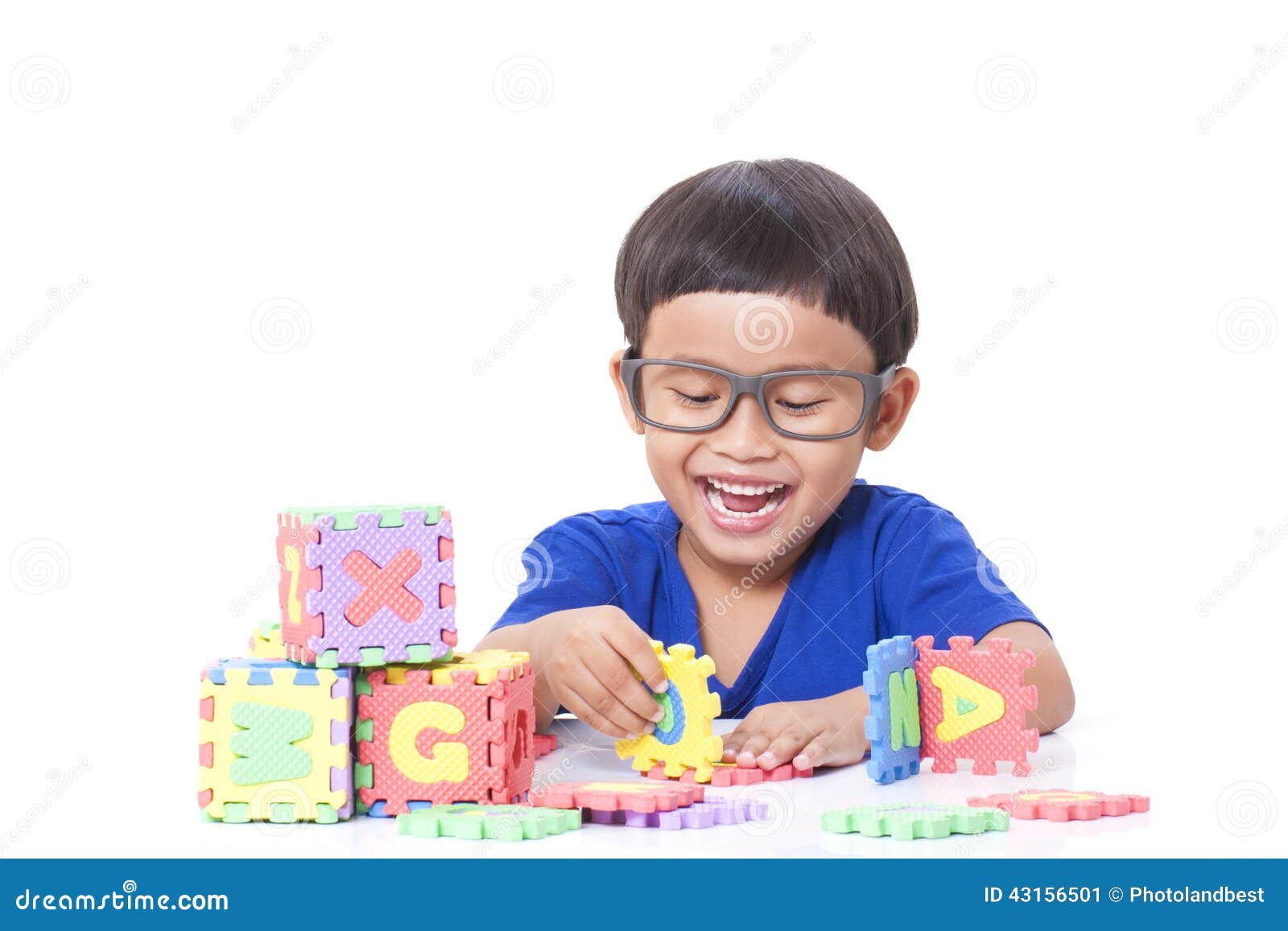 Boy playing with letters stock image. Image of child - 43156501