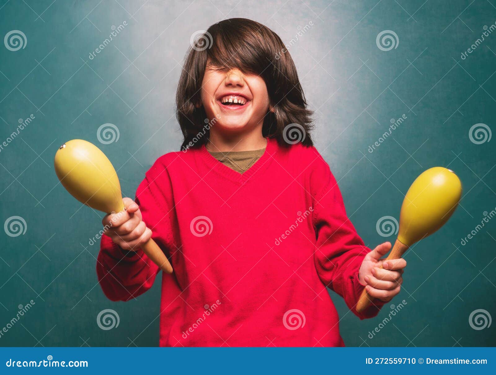 Boy Playing the Maracas in the School Stock Photo - Image of closeup ...