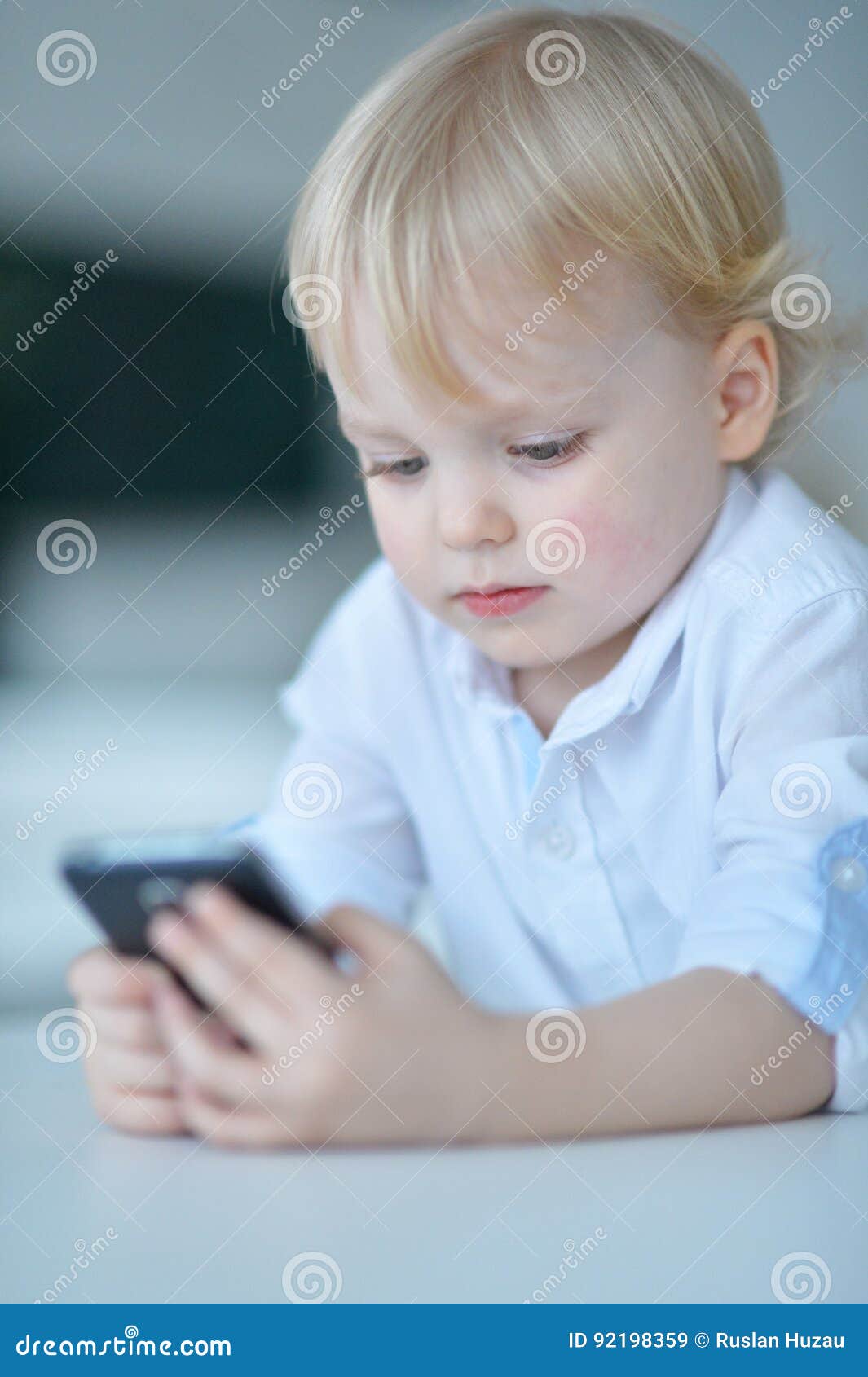 Boy is Playing with a Mobile Phone Stock Image - Image of technology ...