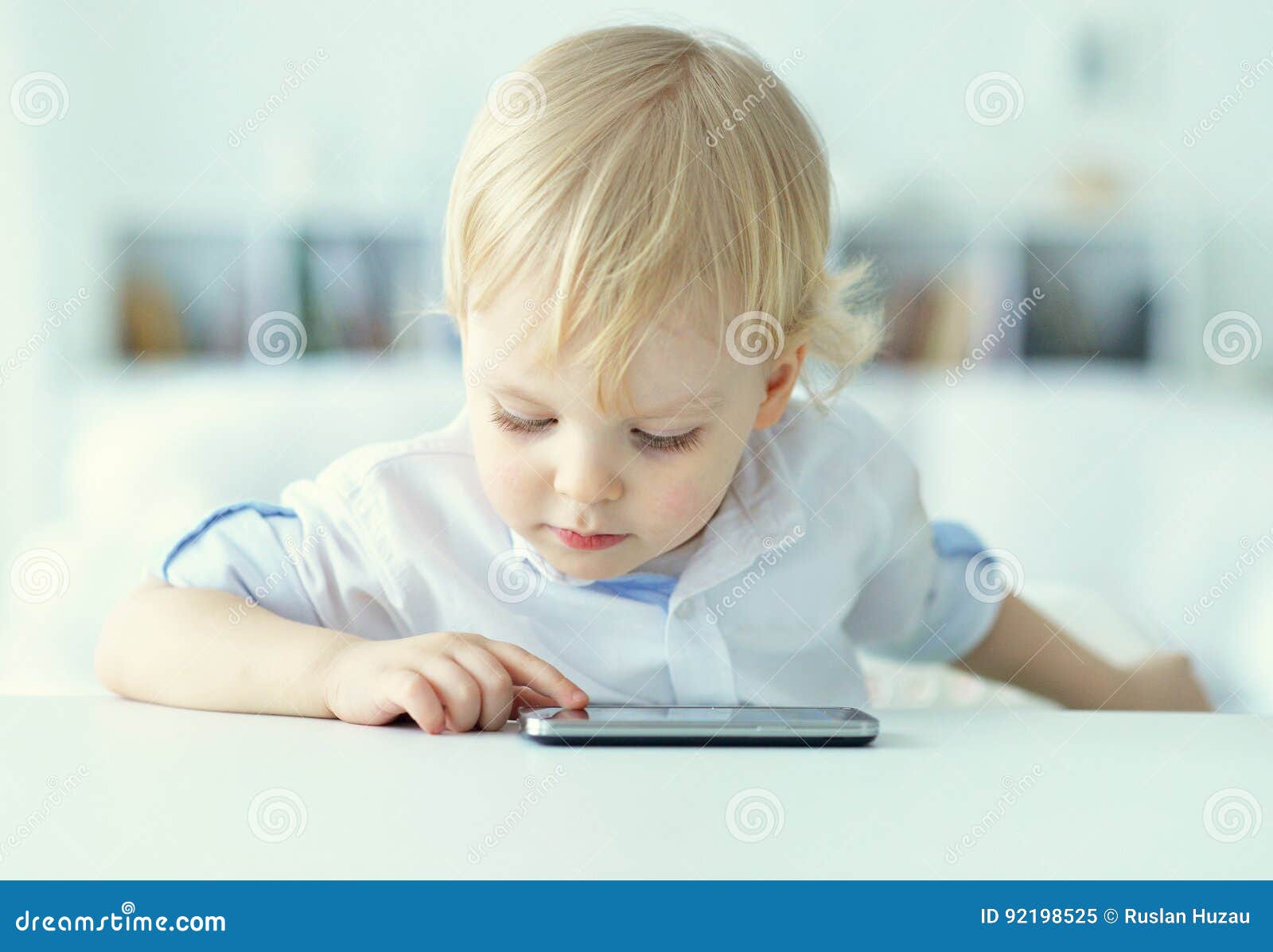 Boy is Playing with a Mobile Phone Stock Image - Image of smart, little ...
