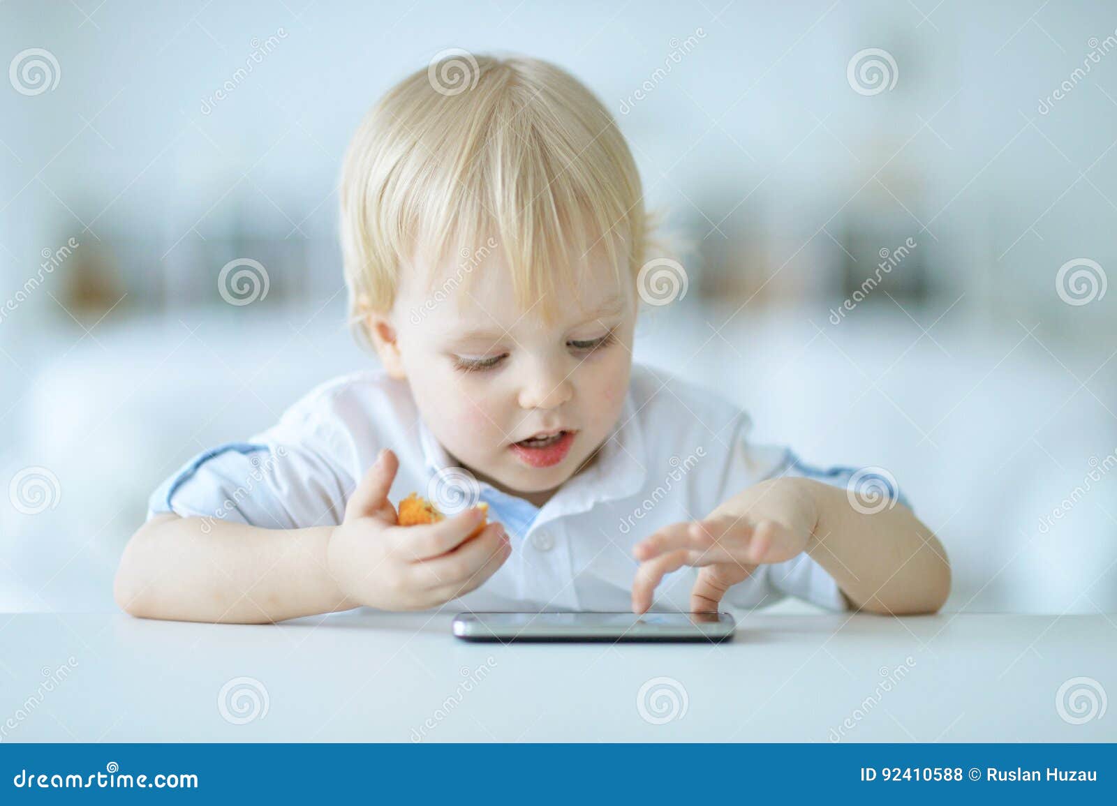 Boy is Playing with a Mobile Phone Stock Photo - Image of cellphone ...