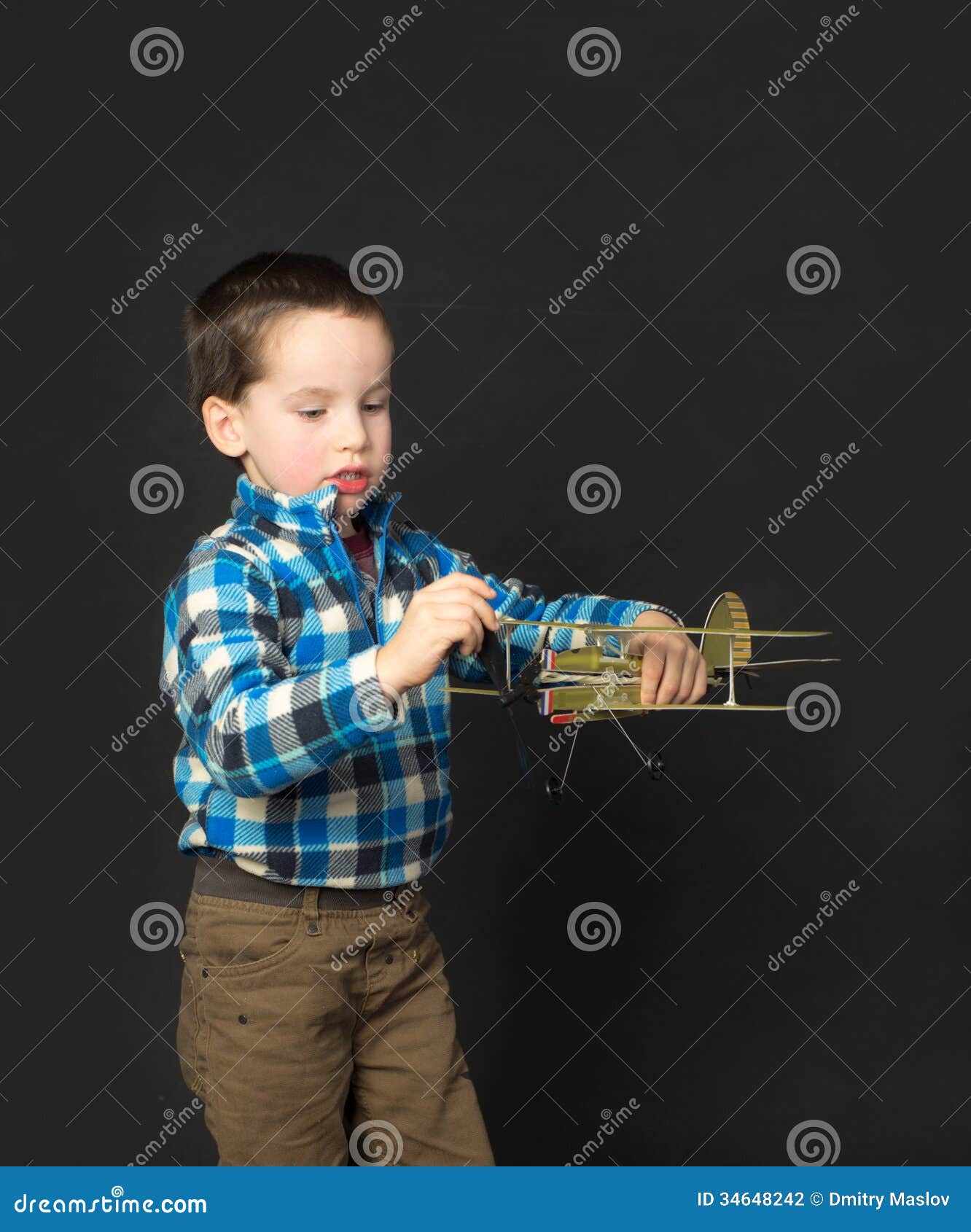 Boy Playing with a Model Airplane Stock Photo - Image of caucasian ...