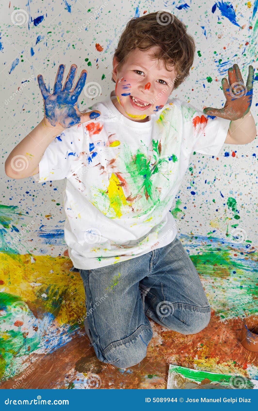 Boy playing with painting stock photo. Image of play, color - 5089944
