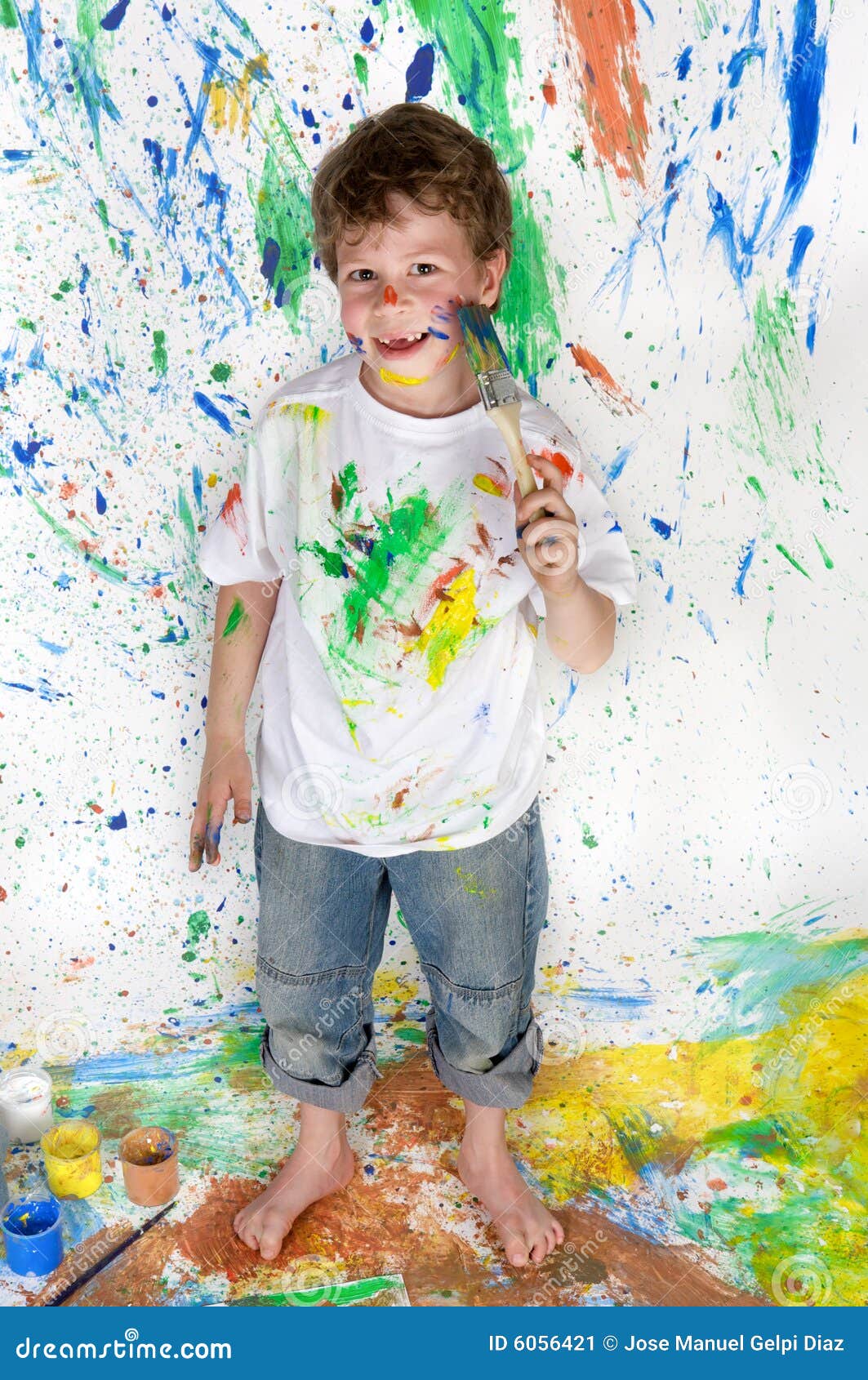 Boy playing with painting stock image. Image of happy - 6056421
