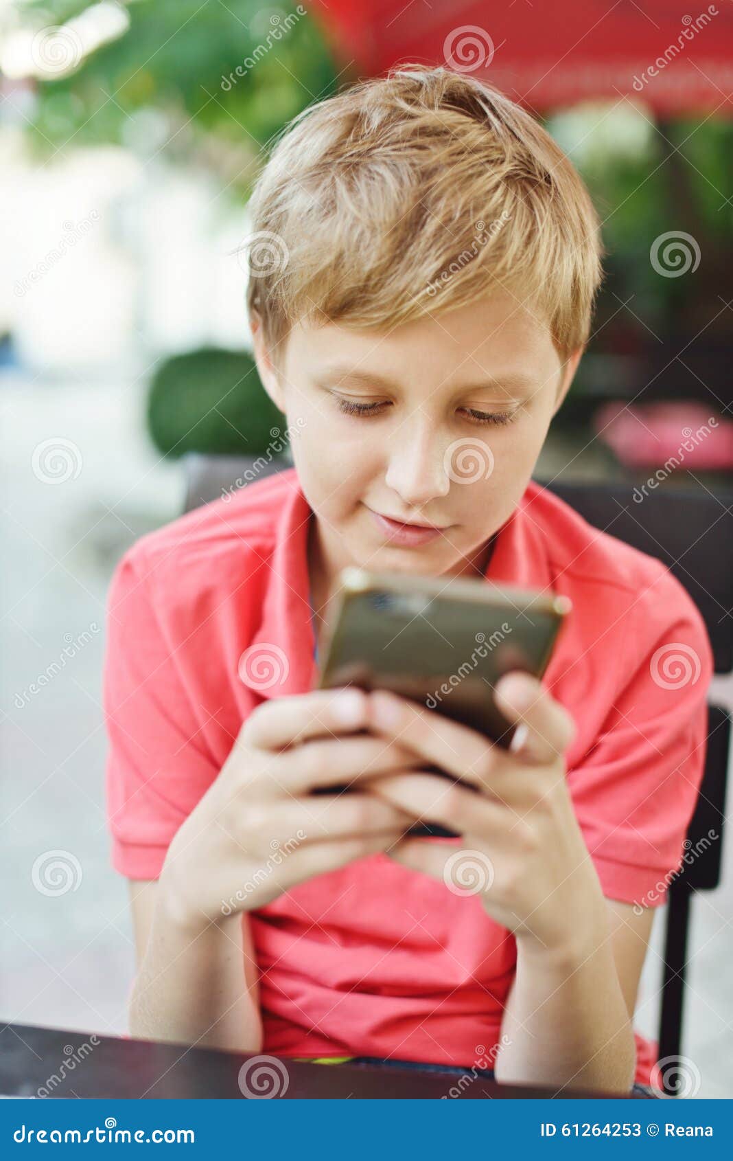 Boy playing phone stock image. Image of smart, phone - 61264253