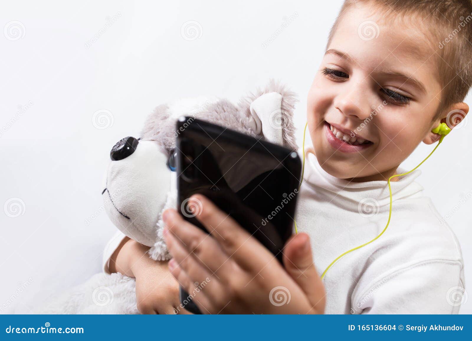 Boy playing with phone stock photo. Image of face, communication ...