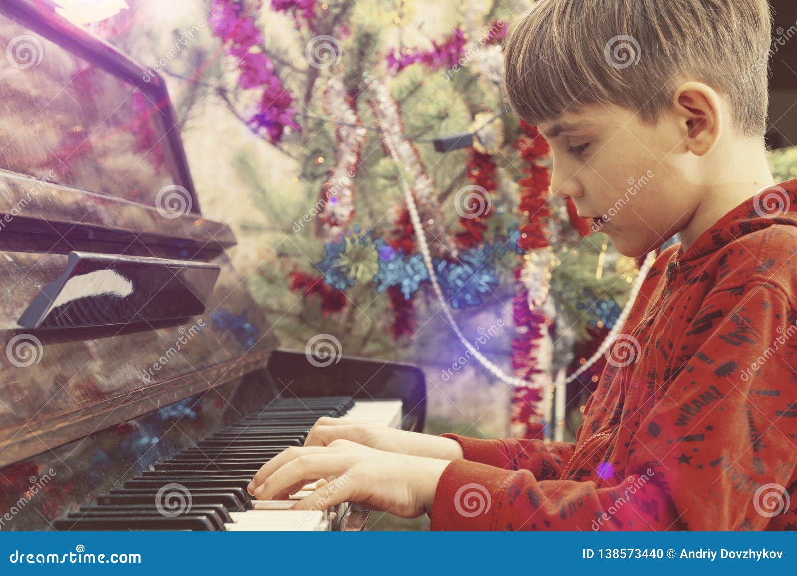 Boy playing piano stock photo. Image of pianist, beautifully - 138573440