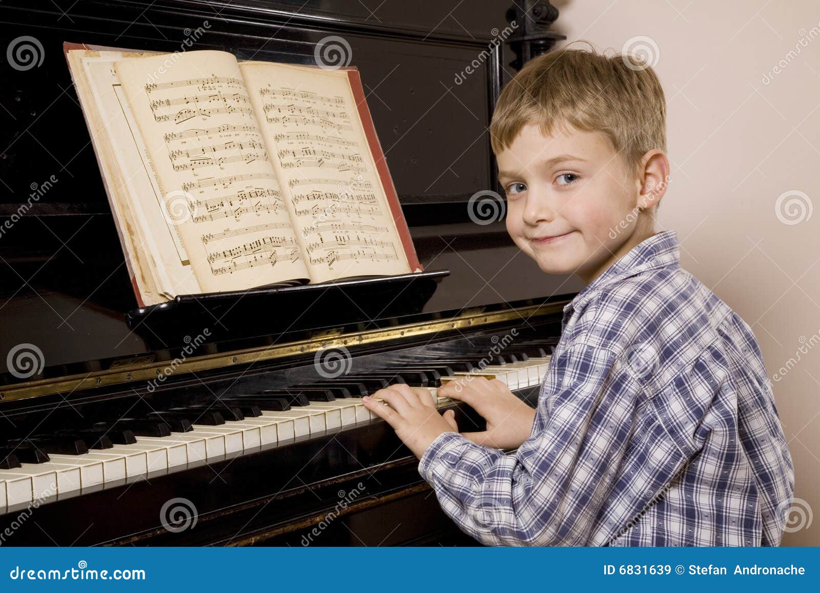 Boy playing the piano stock image. Image of notes, keyboard - 6831639