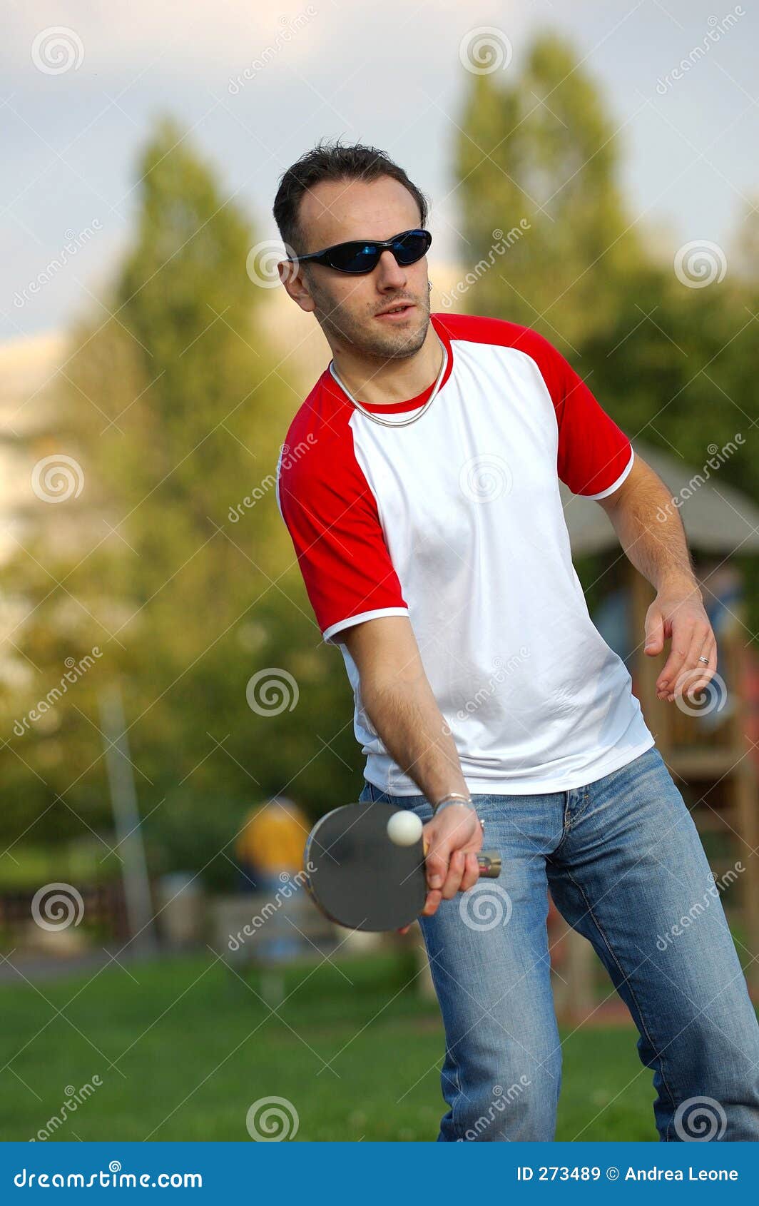 Boy playing ping pong stock image. Image of compete, jeans - 273489