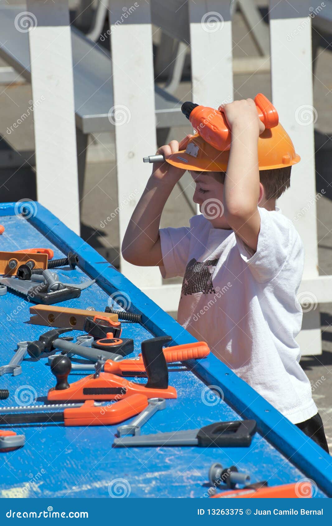 Boy Playing with Plastic Tools Stock Image - Image of child, site: 13263375