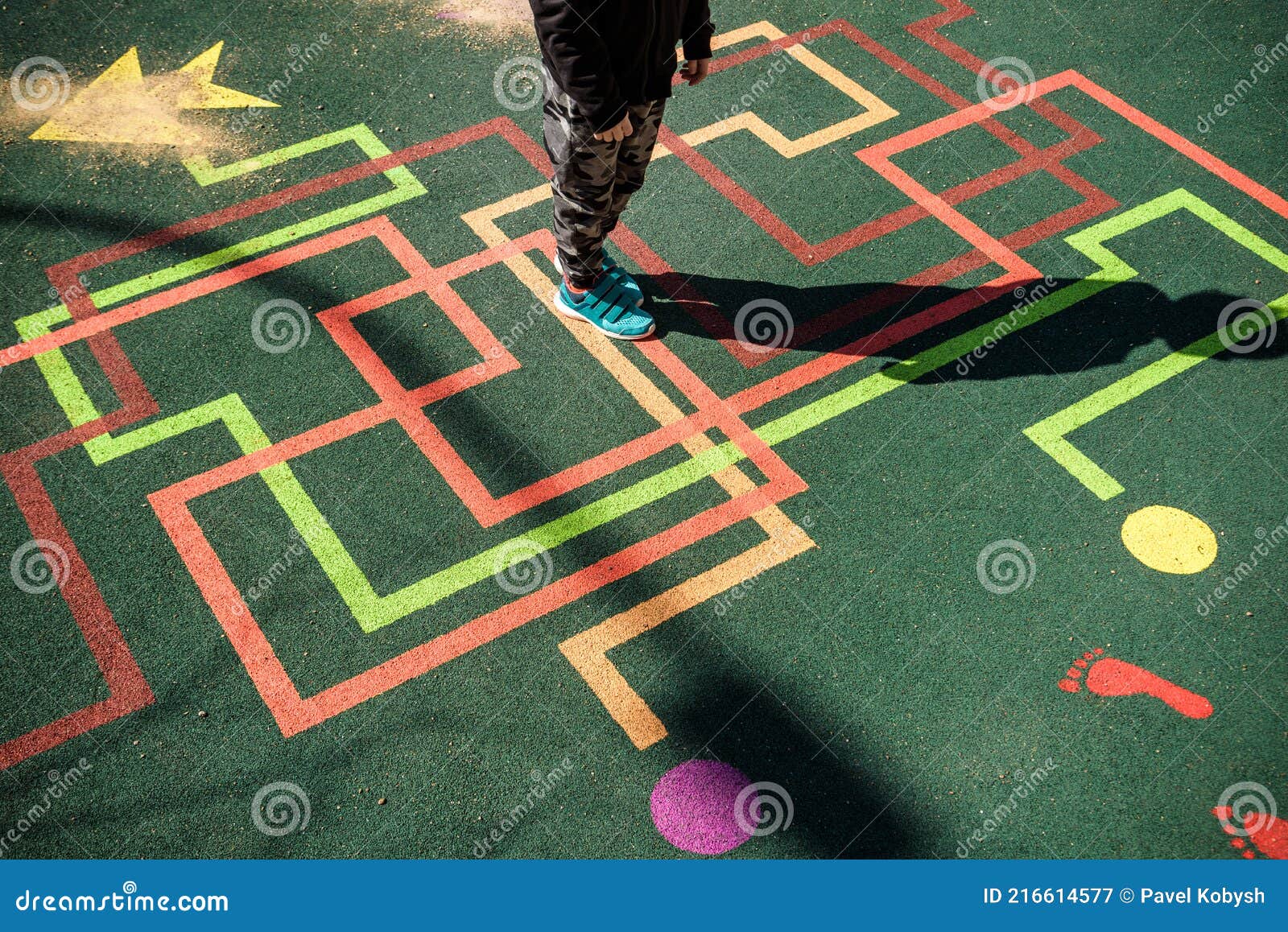 Boy Playing on the Playground, in the Children`s Maze. Children`s Slide ...