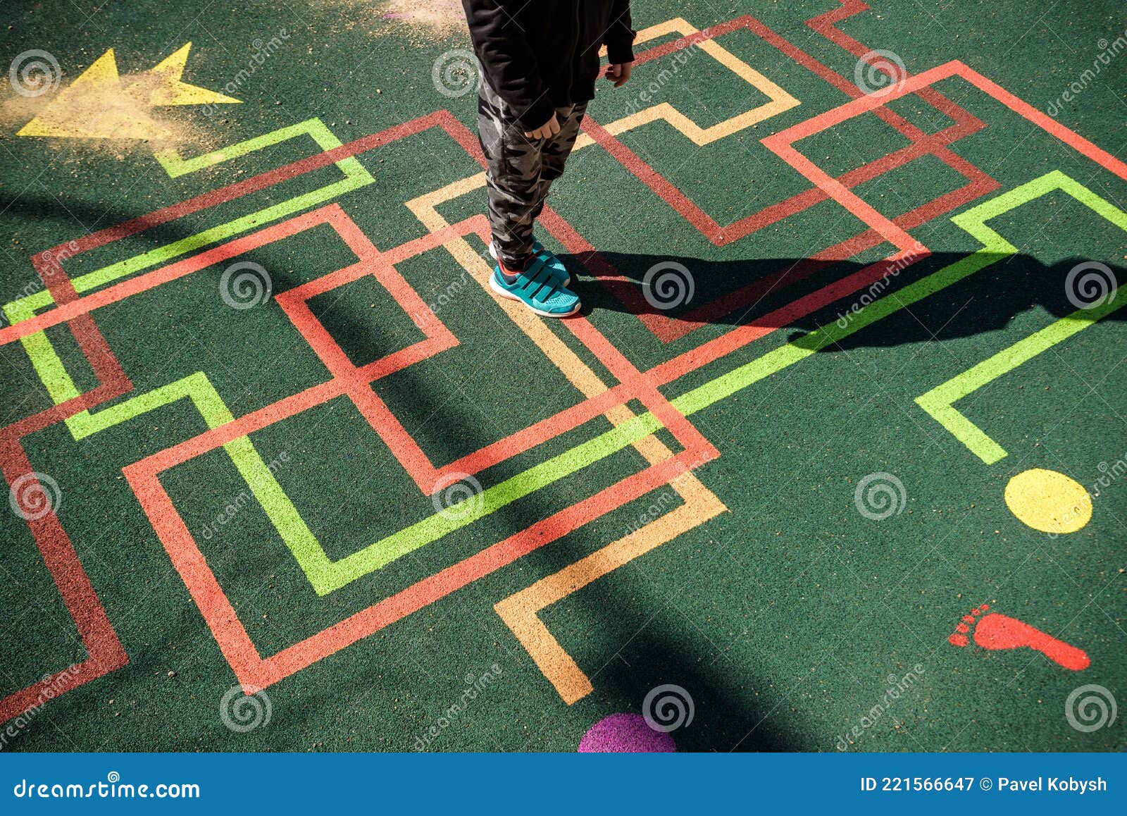 Boy Playing on the Playground, in the Children`s Maze. Children`s Slide ...