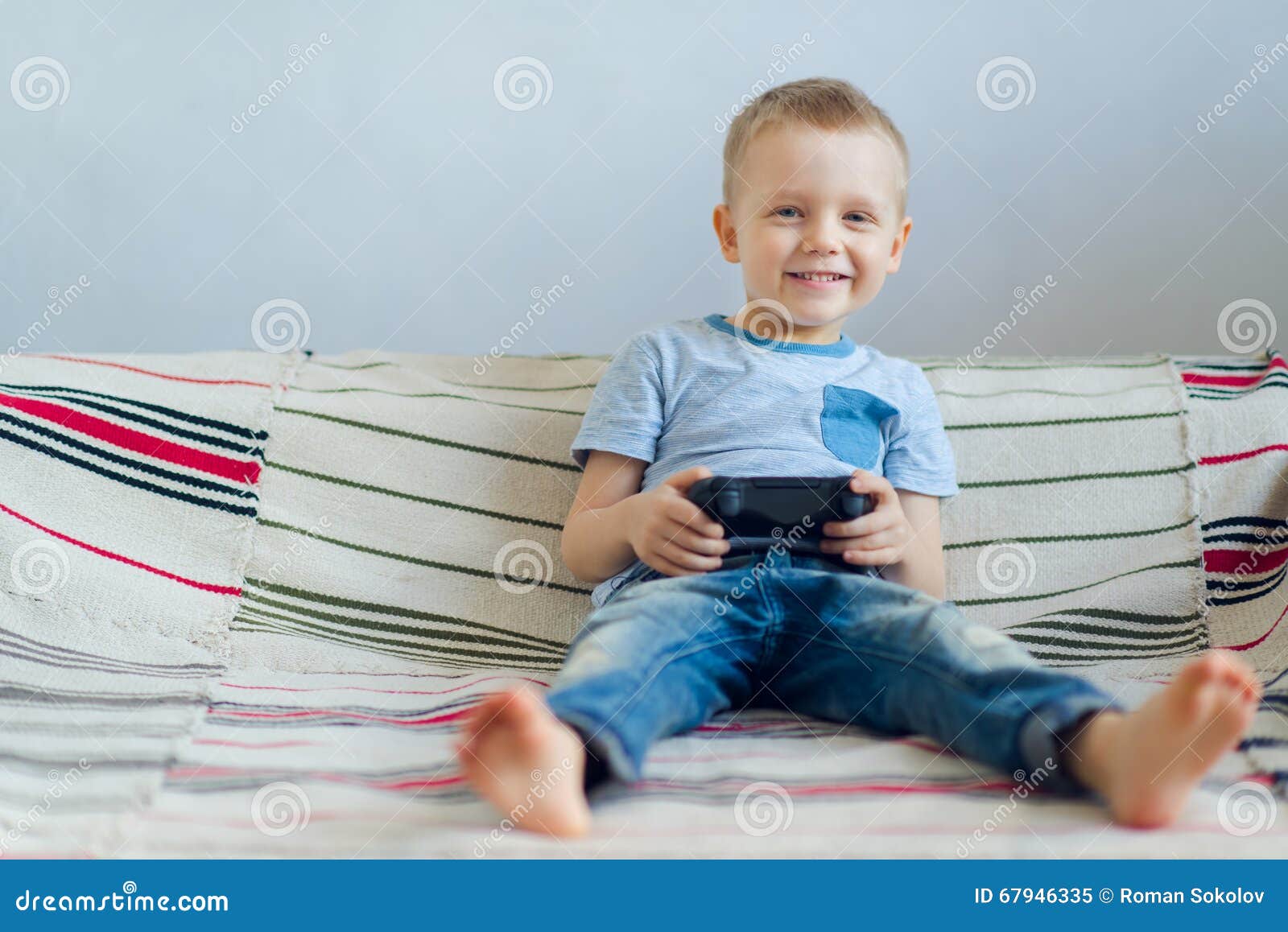 Boy Playing with Playstation Stock Image - Image of background, floor ...