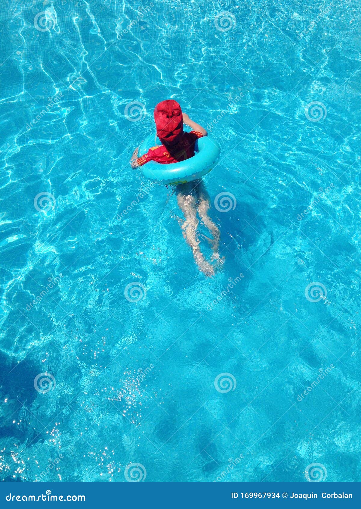 Boy Playing in the Pool with Floats Stock Photo - Image of pool, relax ...