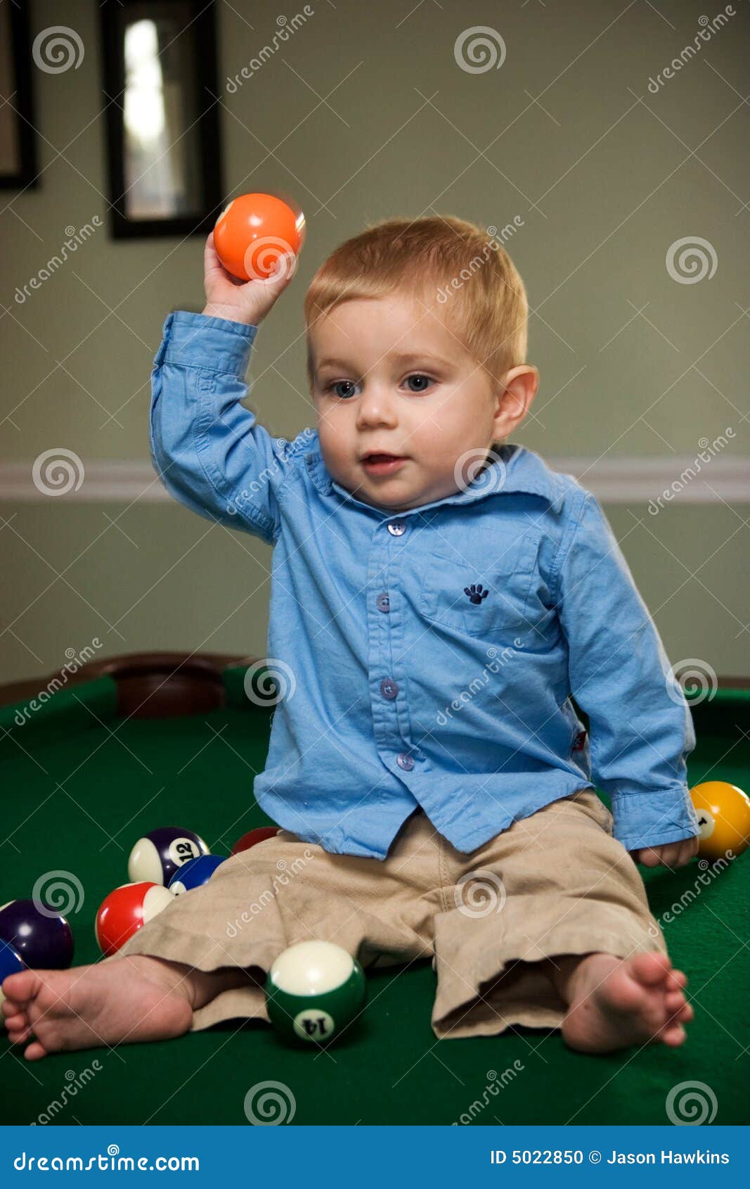 Boy playing on pool table stock photo. Image of lovable - 5022850