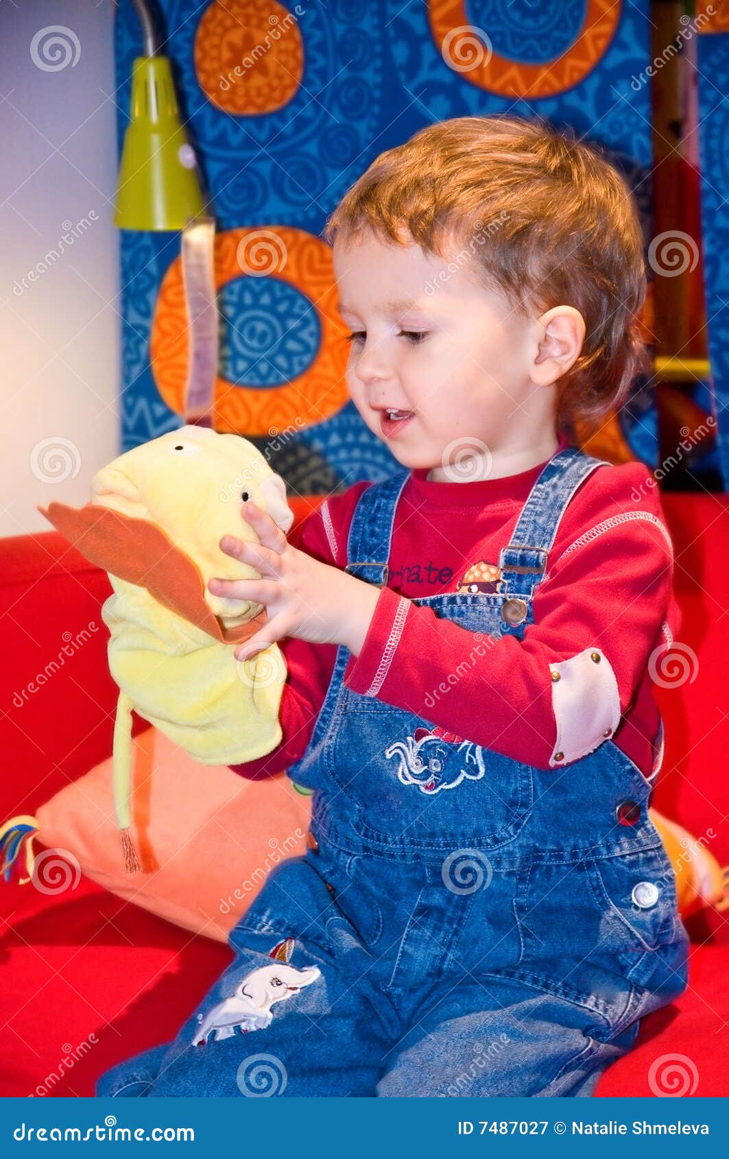Boy playing with a puppet stock image. Image of fashionable - 7487027