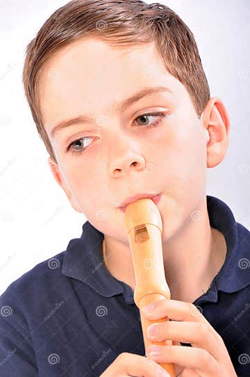 Boy playing recorder stock image. Image of music, young - 10500603