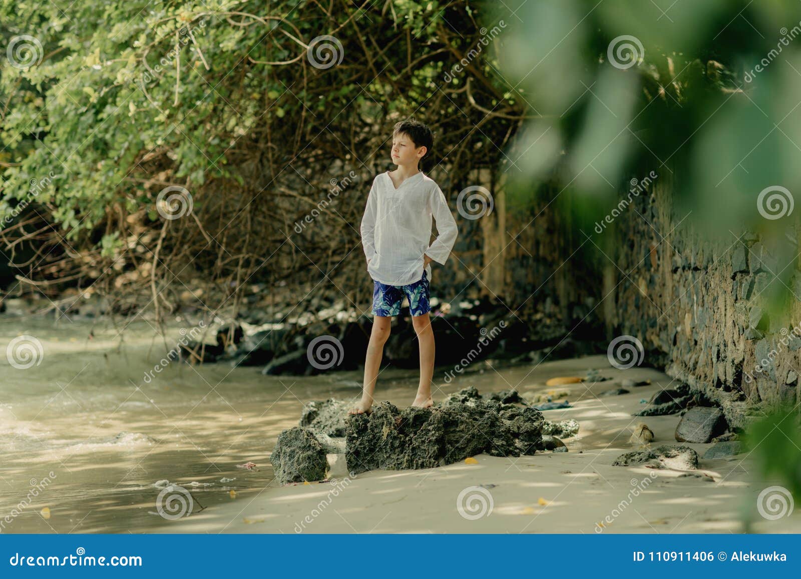 The Boy is Playing on Rocks Stock Photo - Image of mekong, beauty ...