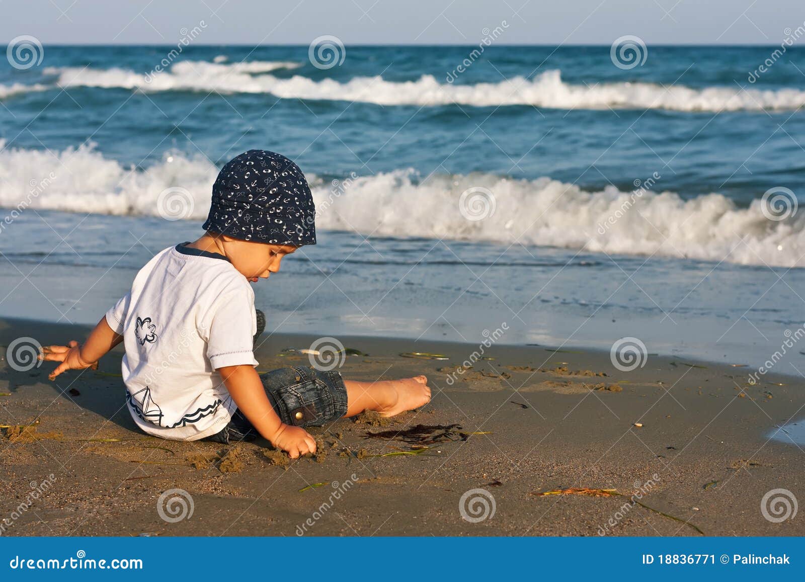 Boy playing with sand stock image. Image of childhood - 18836771