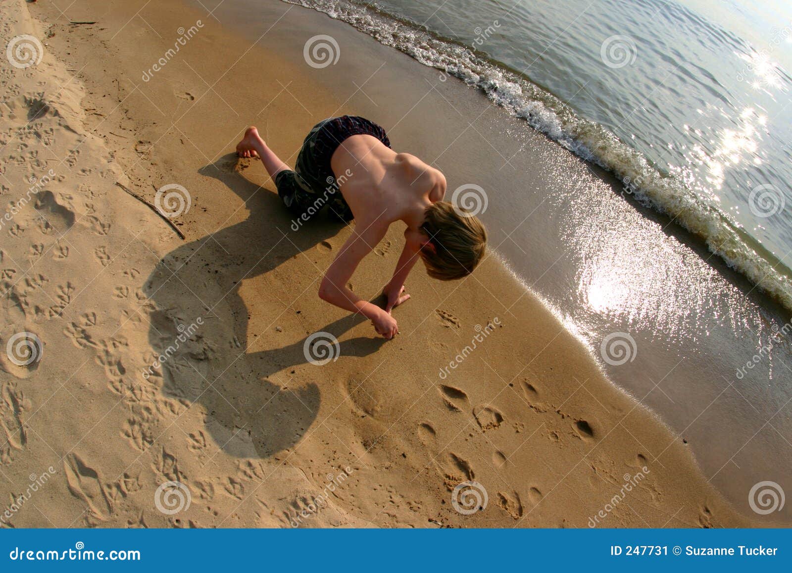 Boy Playing in Sand on Beach Stock Image - Image of resort, relax: 247731