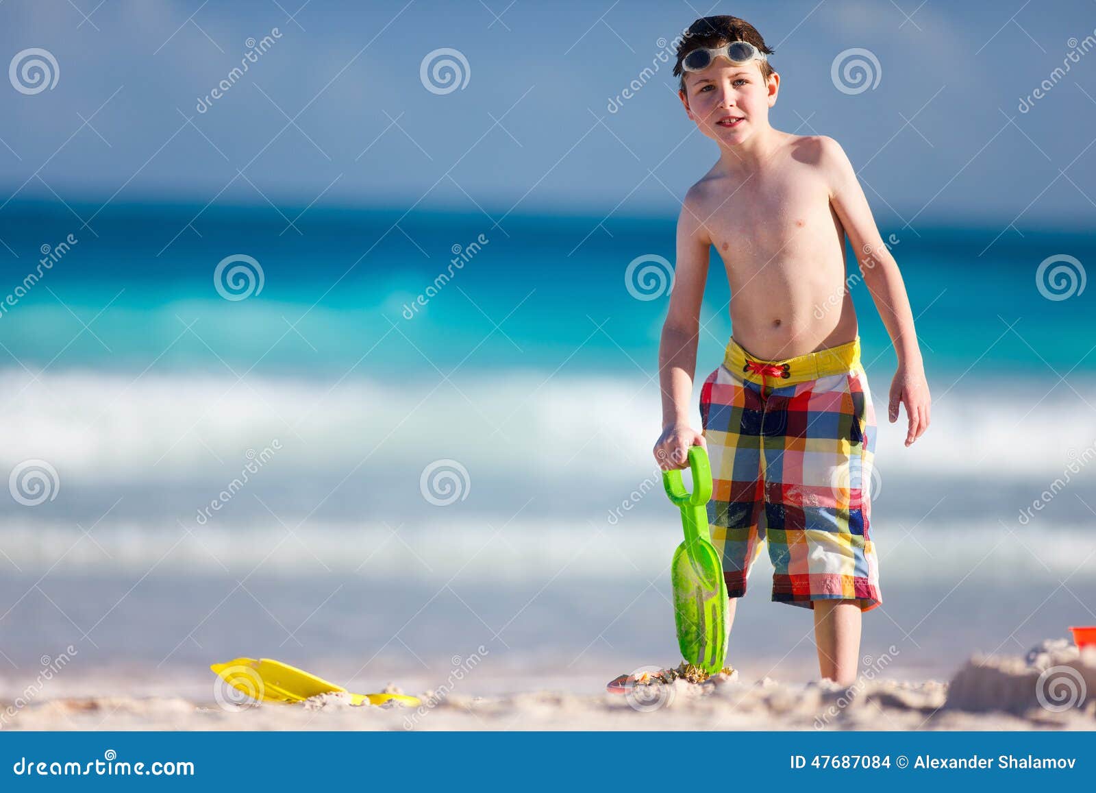 Boy playing with sand stock photo. Image of youth, playing - 47687084