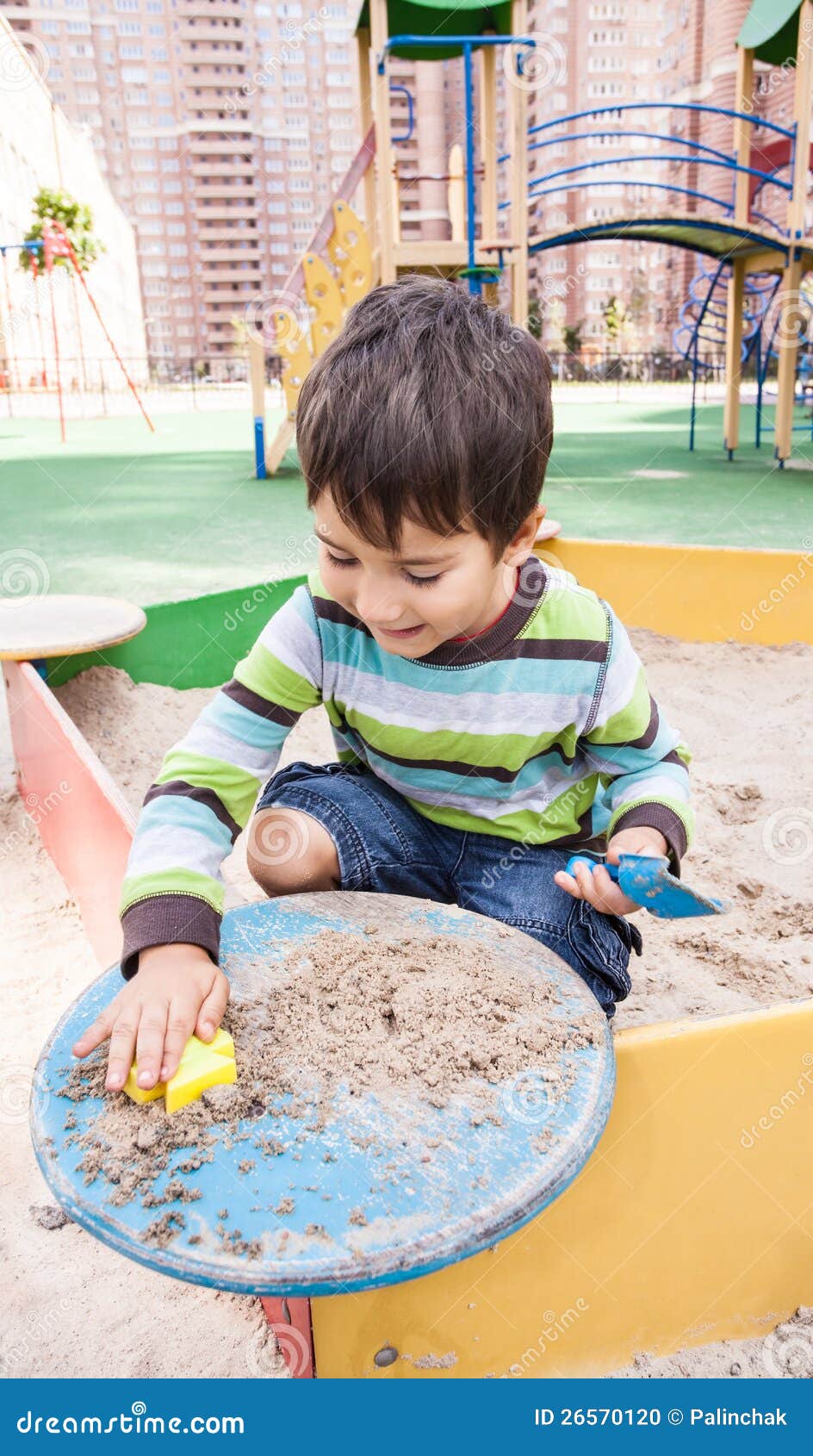 Boy playing in sandbox stock photo. Image of grow, action - 26570120