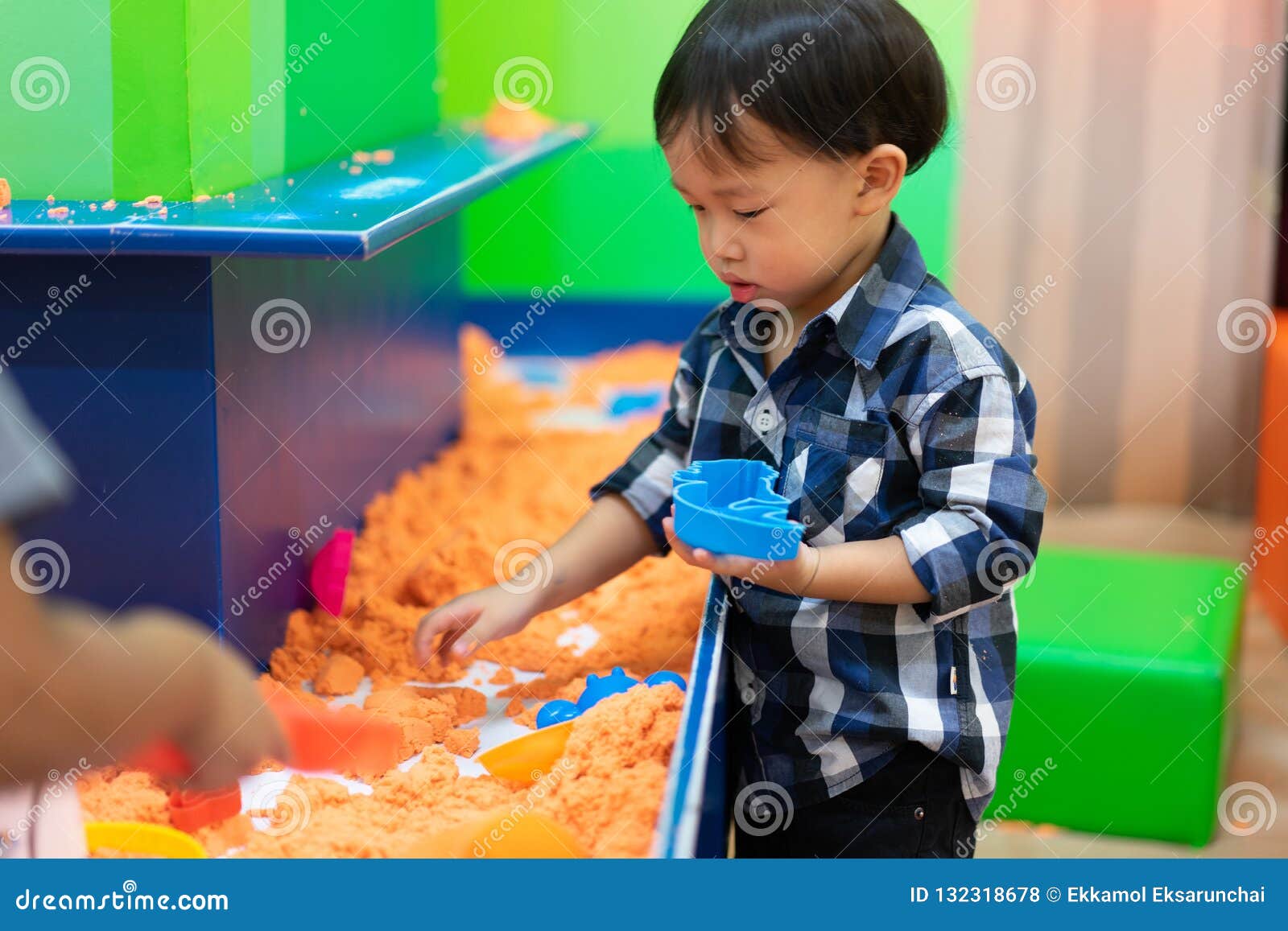 A Boy is Playing Science Sand at the Playground Stock Photo - Image of ...