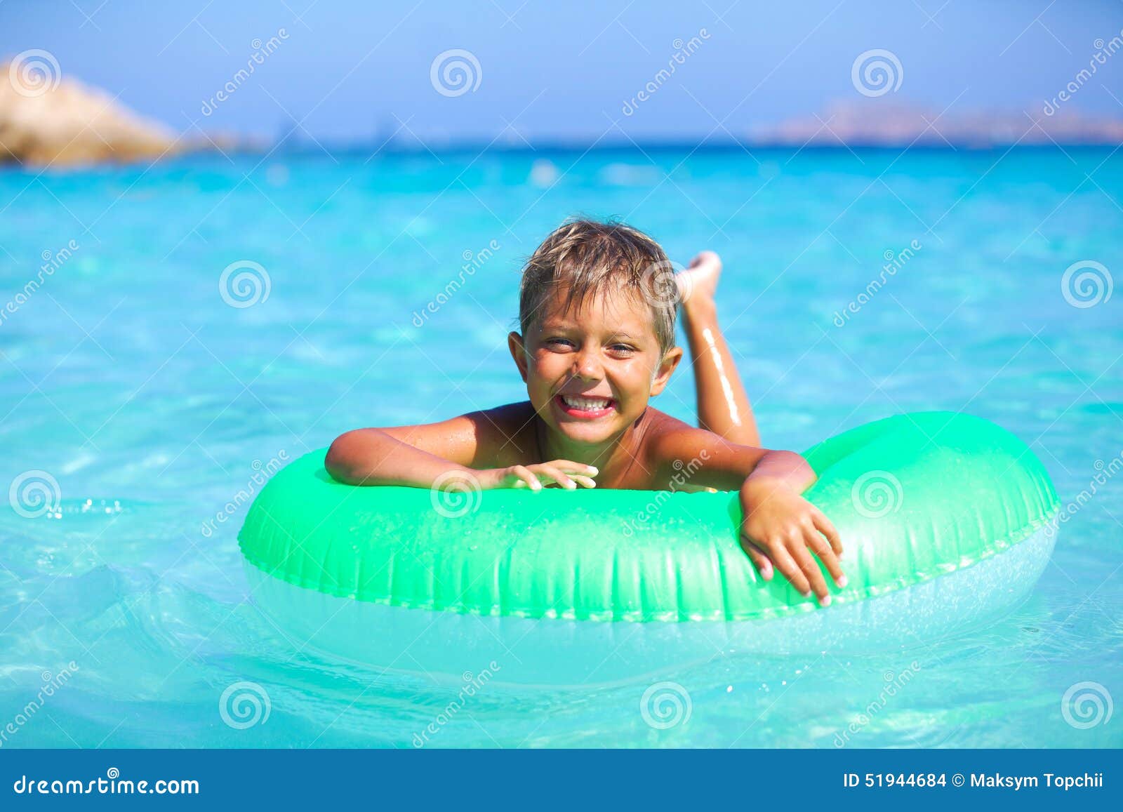 Boy playing in the sea stock photo. Image of funny, people - 51944684