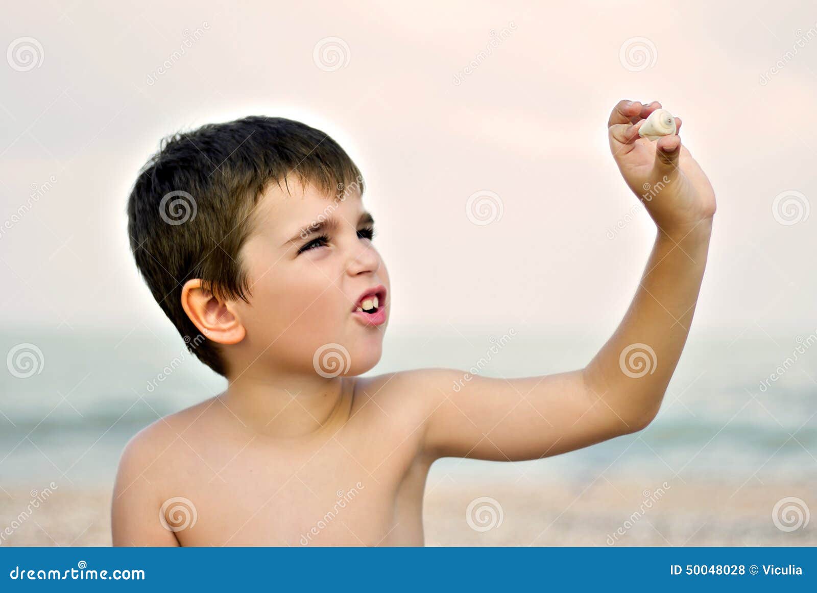 Boy Playing a Seashell on a Beach Stock Photo - Image of outside, child ...