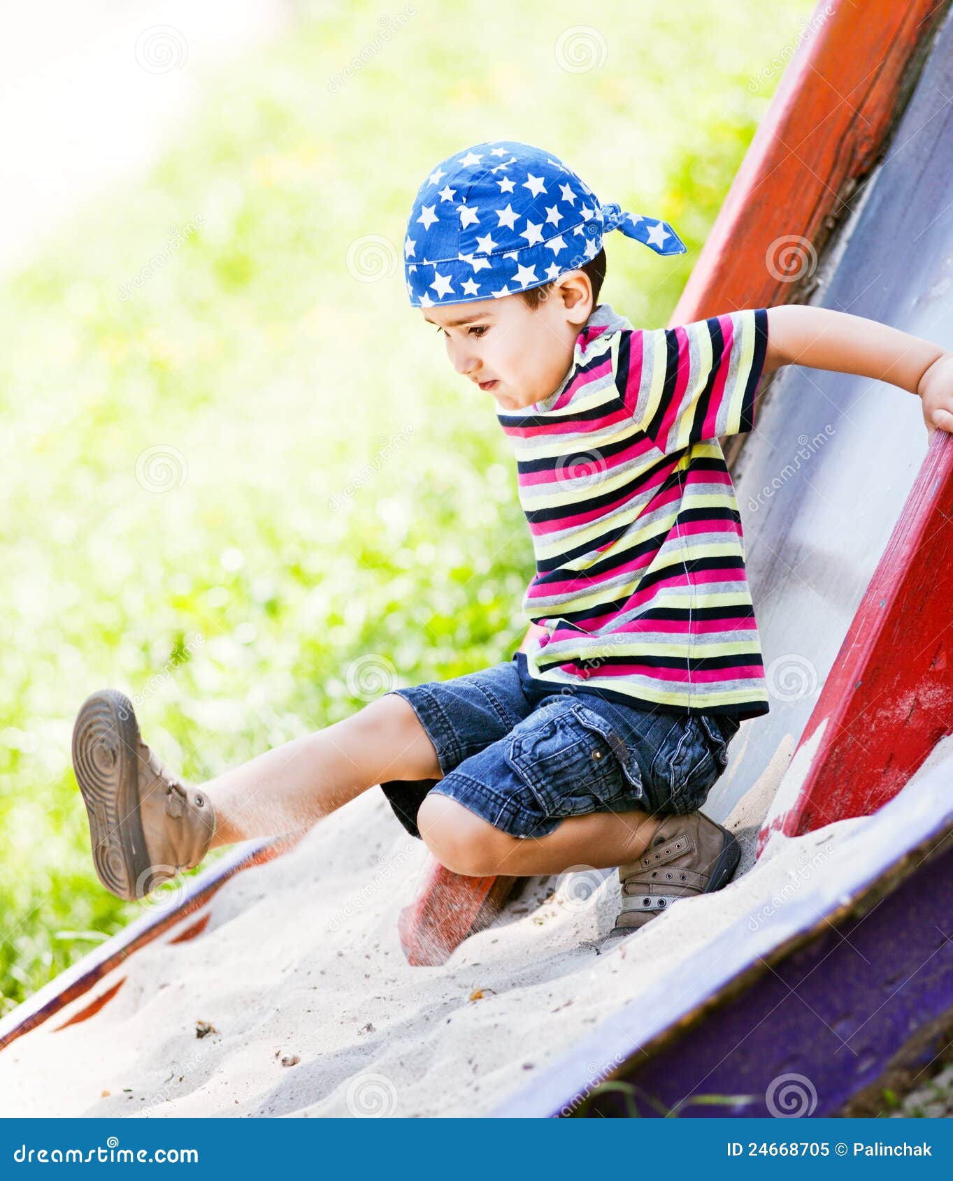 Boy playing on slide stock image. Image of enjoyment - 24668705