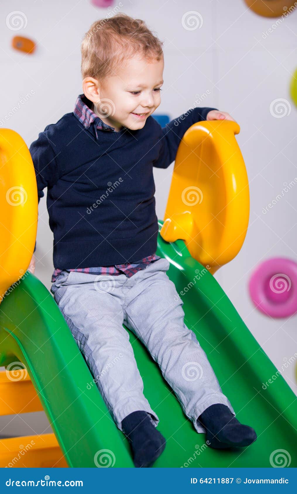Boy Playing on the Slide at the Playground Stock Image - Image of ...