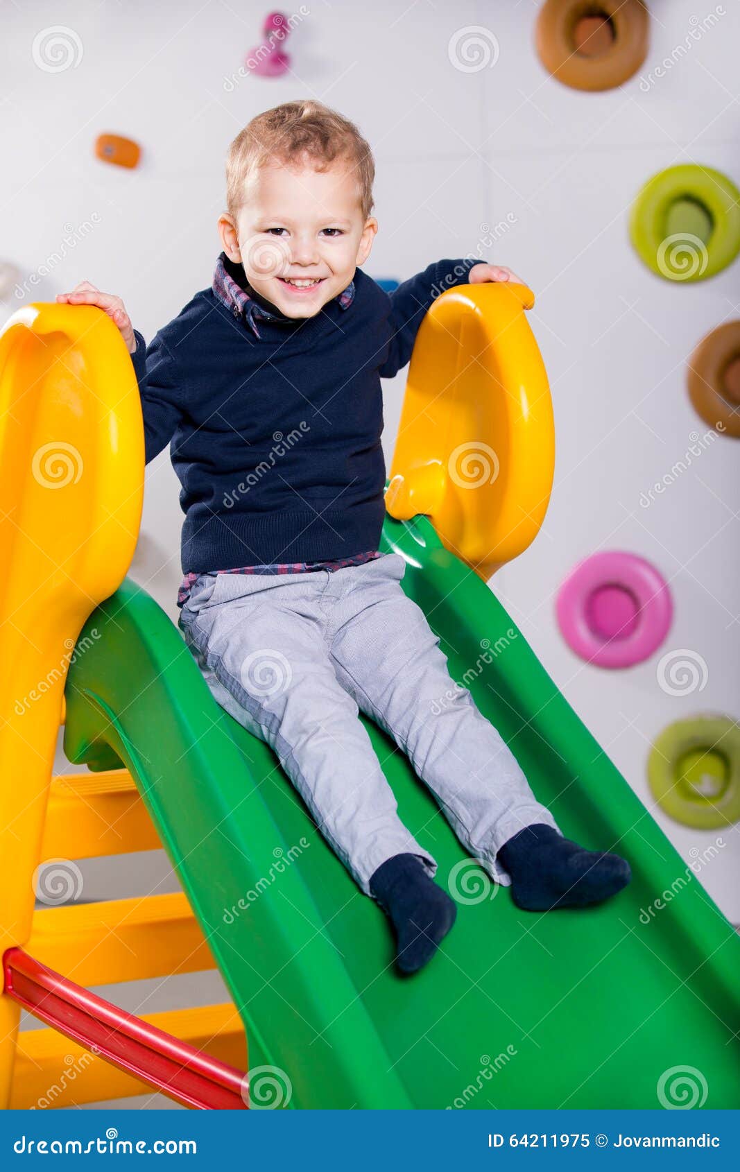 Boy Playing on the Slide at the Playground Stock Image - Image of ...
